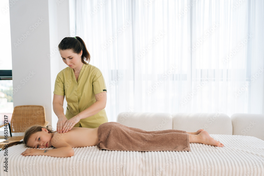 Stock-Foto „Portrait of professional female pediatric masseuse ...