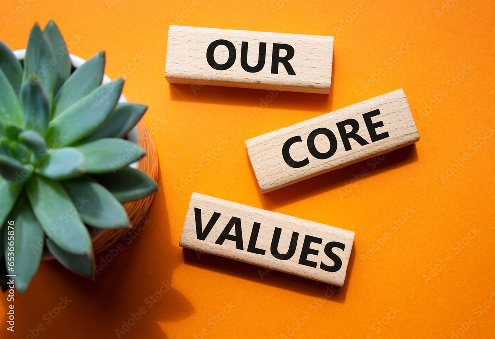 Our core values symbol. Concept words Our core values on wooden blocks ...