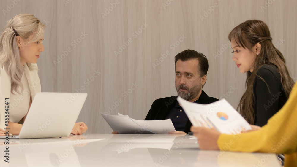 CEO talks to employees in office meeting Present ideas for projects ...