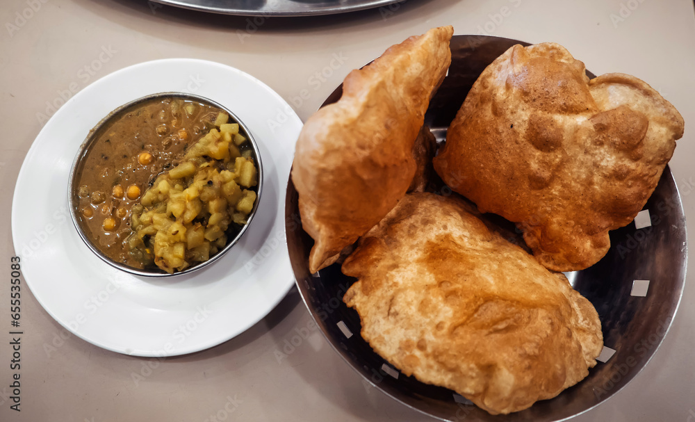 Puri Bhaji - popular Indian semi dry Potato Spicy recipe also known as ...