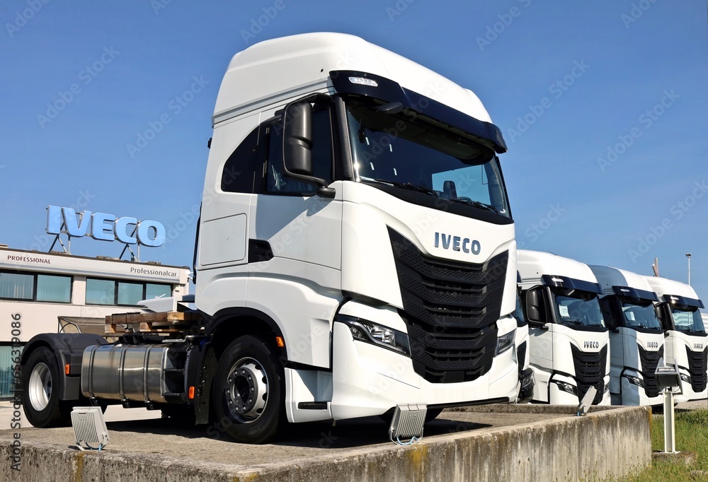 Pradamano, Italy. September 30, 2023. Iveco semi trucks on display in a ...
