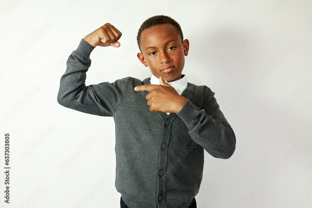 Portrait of serious cool confident african american kid posing against ...