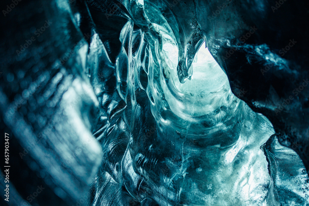 Winter region with frozen shattered rocks and Vatnajokull blue icy ...