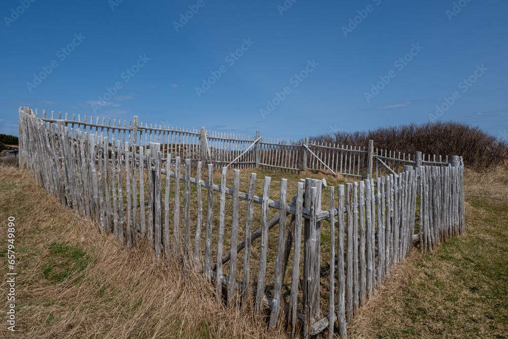 A rustic old-fashioned cattle corral made of logs. The weathered fence ...