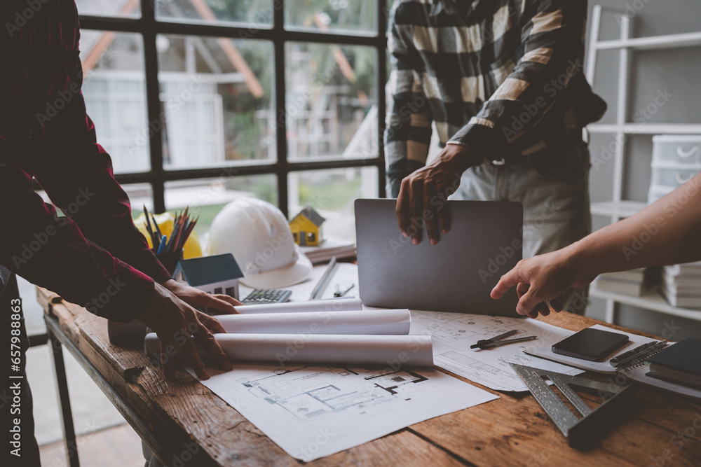 Architects and engineers work together in business, submitting ...