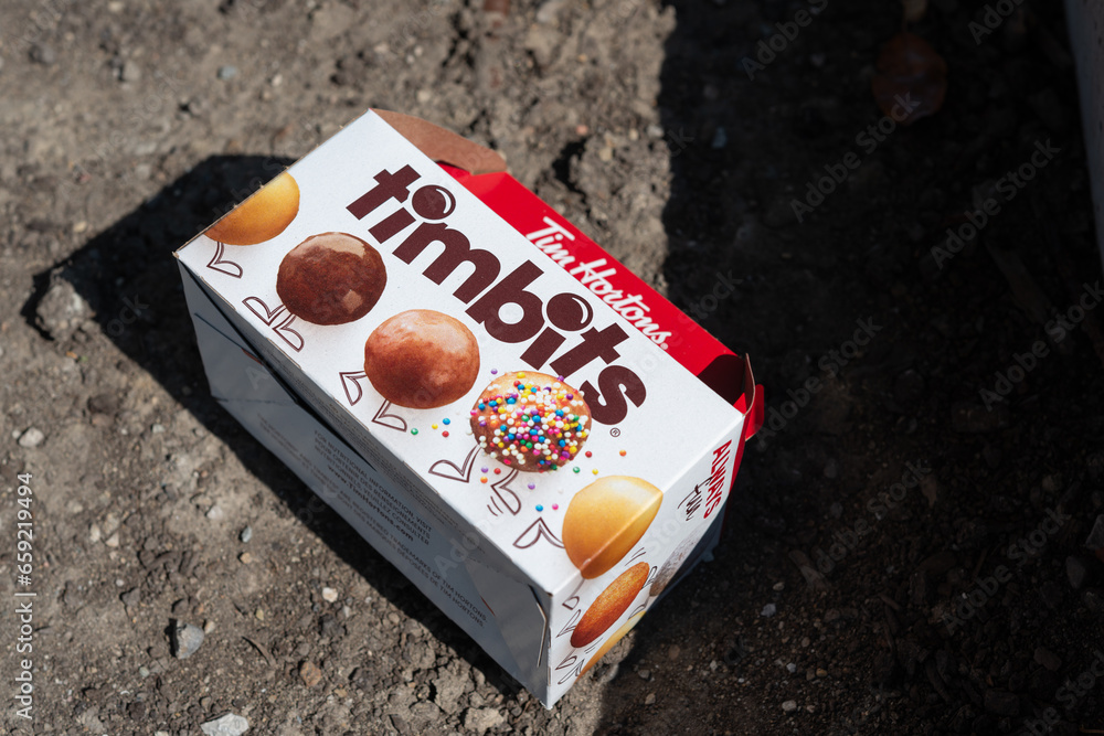 discarded cardboard box that once contained Timbits, bite-sized ...