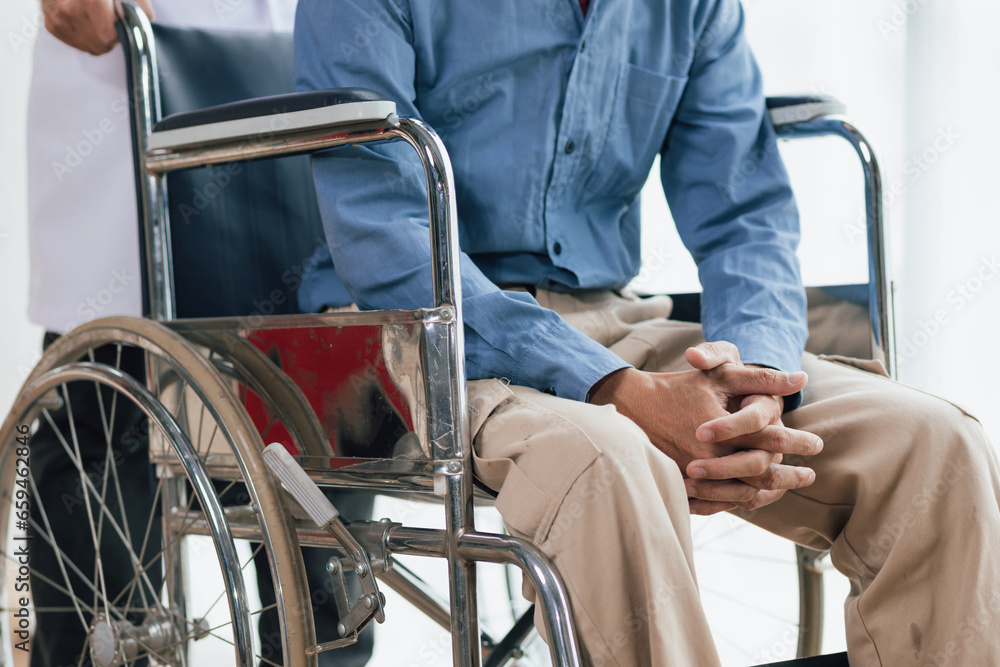 Patient with knee pain and unable to walk in a wheelchair sees a doctor ...