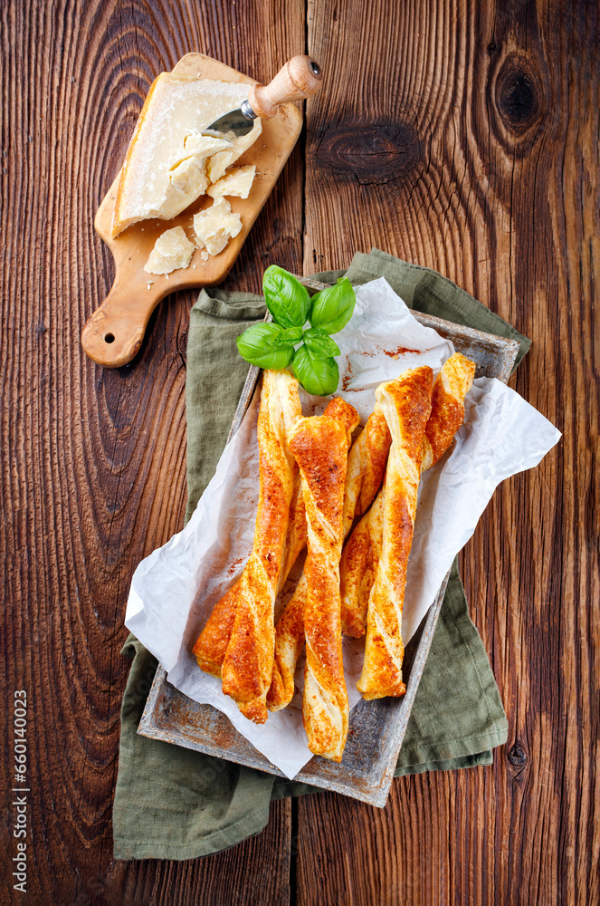 Traditional Italian parmesan cheese puff pastry sticks as a grilled ...