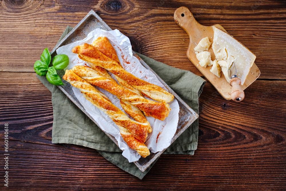 Traditional Italian parmesan cheese puff pastry sticks as a grilled ...