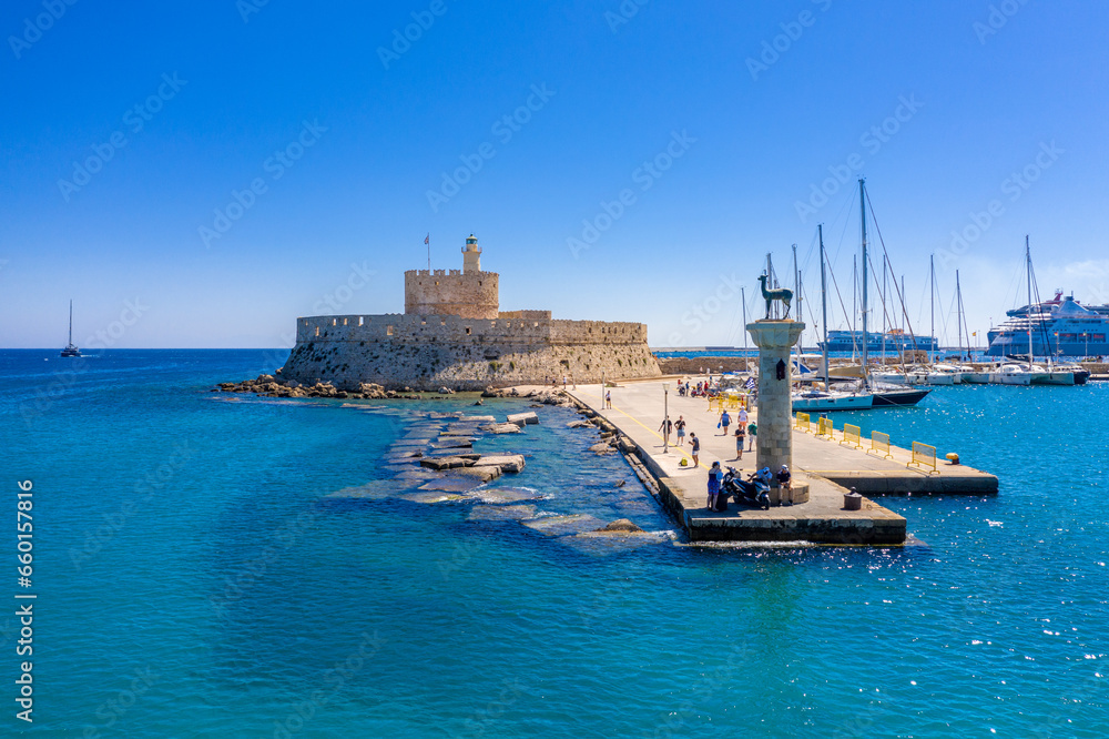 Mandraki port with deers statue, where The Colossus was standing and ...