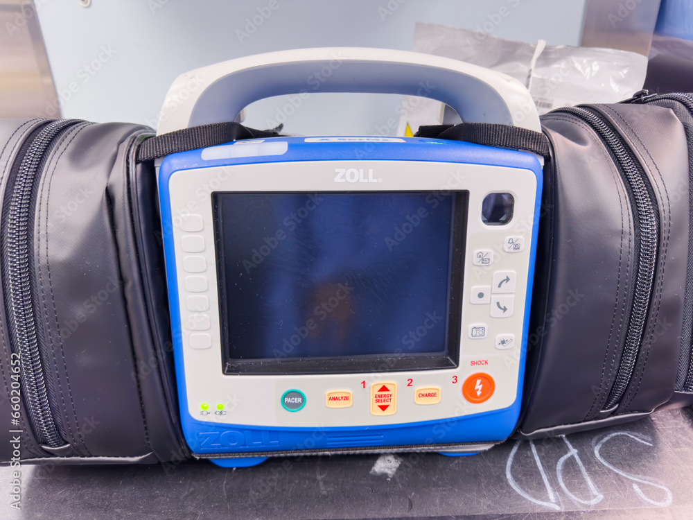 hospital defibrillator AED unit ready for action, symbolizing emergency ...