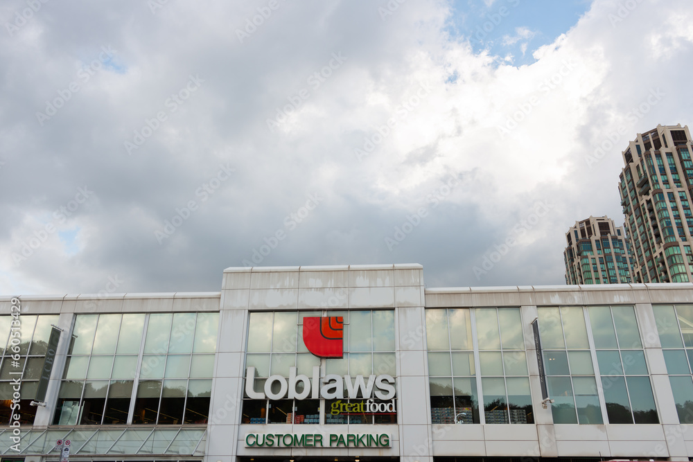 exterior building facade and store front sign of Loblaws grocery store ...