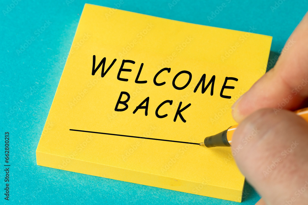 Paper notes with the words Welcome Back ON YELLOW STICKY PAPER NOTE AND ...