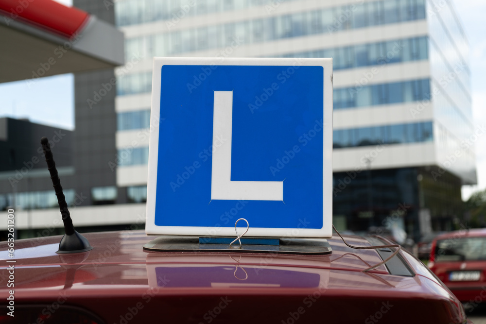Driving school car roof sign. Vehicle rooftop blue learner plate with ...