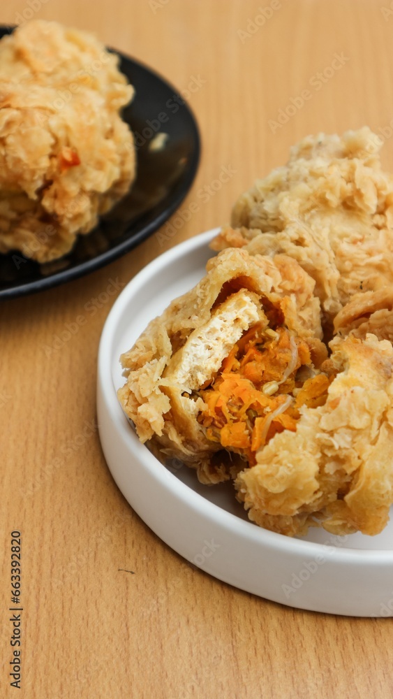 Fried tofu with spicy chiken filling. Often referred to as Tahu Mercon ...