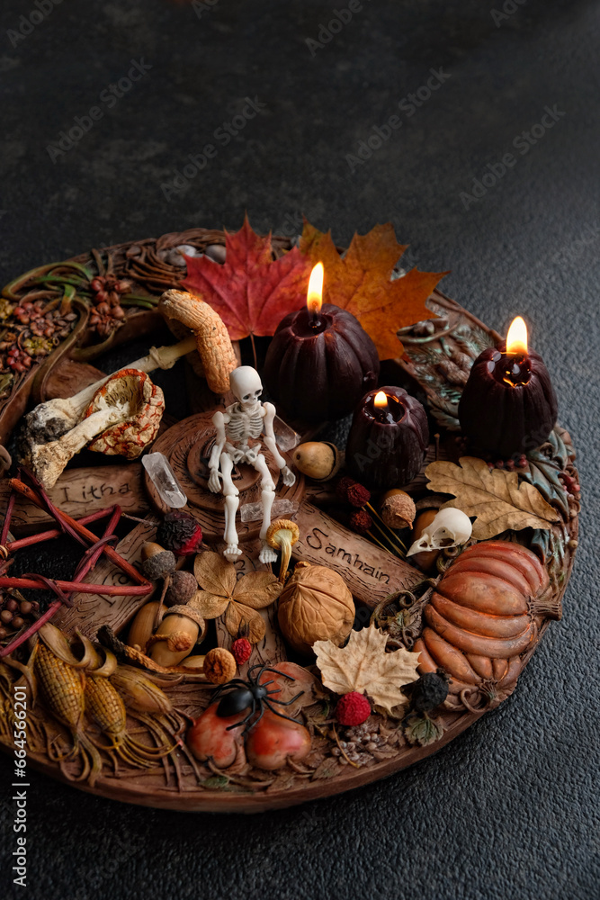 wiccan altar with wheel of the year close up on dark abstract ...