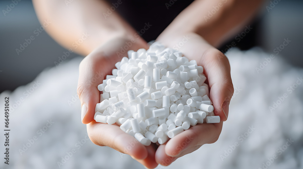 White plastic grain, plastic polymer granules,hand hold Polymer pellets ...