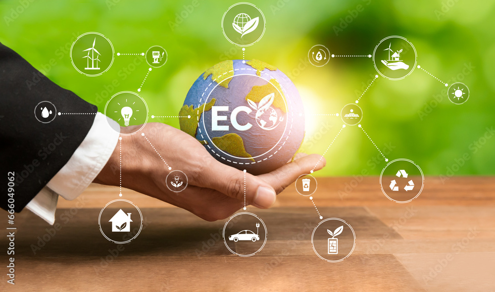 Businessman's hand holding Earth globe symbolize corporate commitment ...