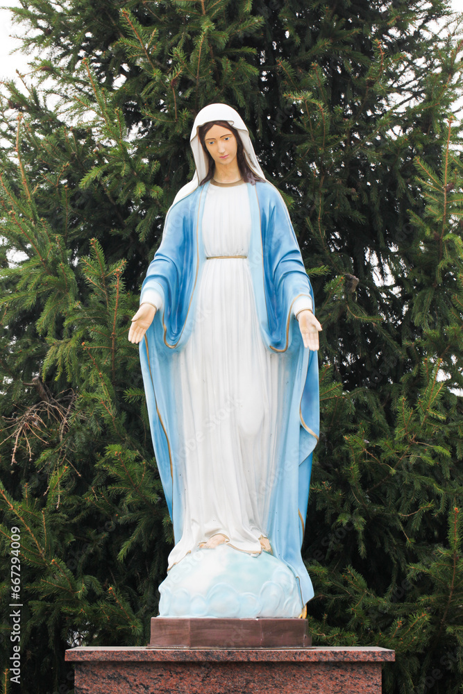 Statue of Virgin Mary. Mother Mary outdoor. Open arms love. Religious ...