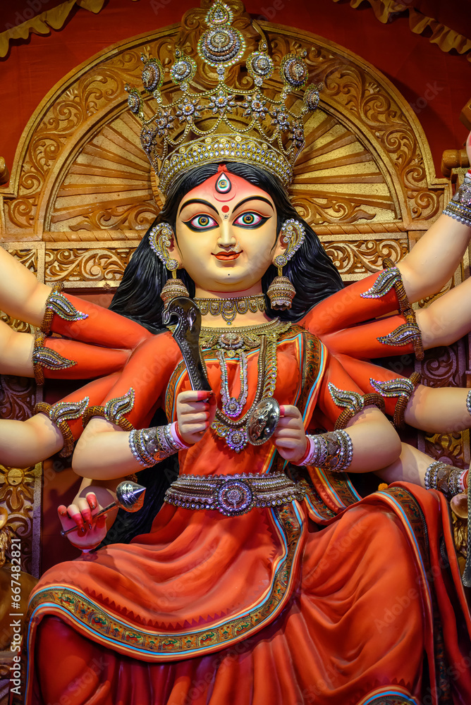 Idol of Goddess Devi Durga at a decorated puja pandal in Kolkata, West ...