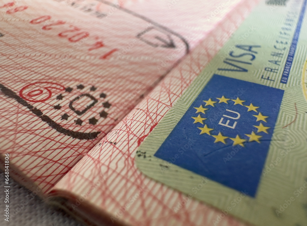 Passport with Schengen Visa and border crossing stamp Stock Photo ...