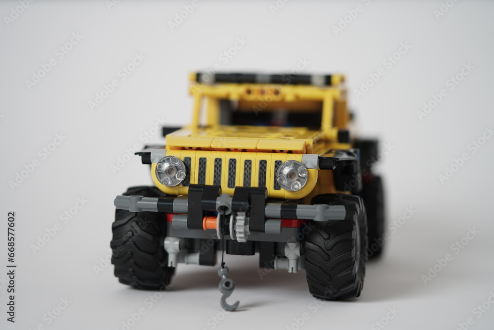 Lego Jeep Wrangler, technic yellow car lego with details. Stock Photo ...