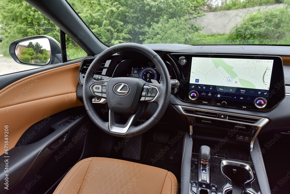 Lexus RX 450h+. A luxury car with a plug-in hybrid drive. Cabin ...