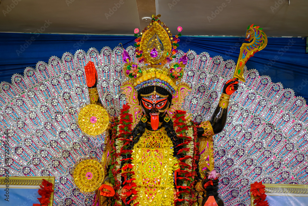 Idol of Goddess Maa Kali at a decorated puja pandal in West Bengal ...