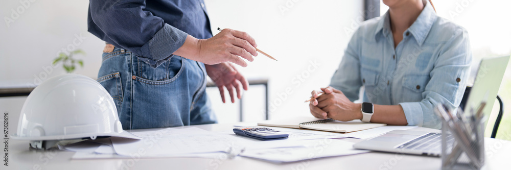 Male engineer architect explain about technical for construction plan ...