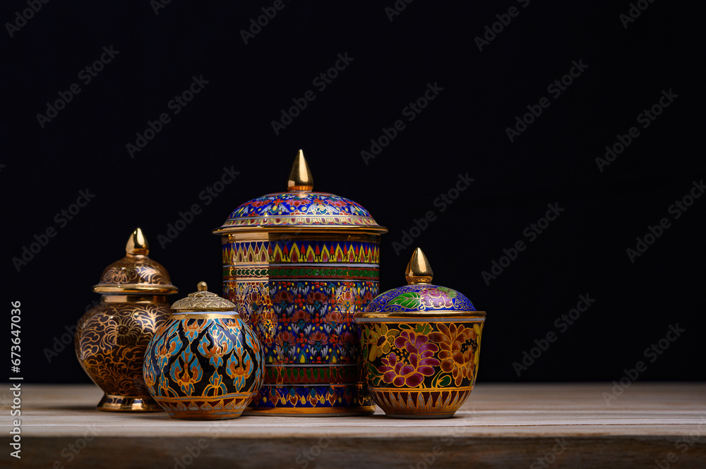Authentic Thai Benjarong porcelain with vibrant jewel-toned patterns ...