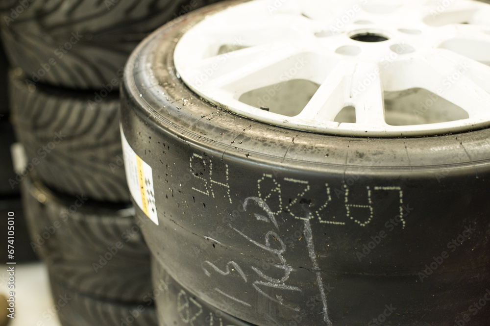 race car spare wheels, lightweight rims with racing rubber slicks Stock ...