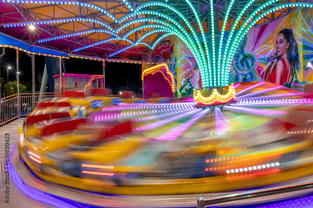 The Tilt-A-Whirl ride gives riders a thrill at full speed at Old Town ...