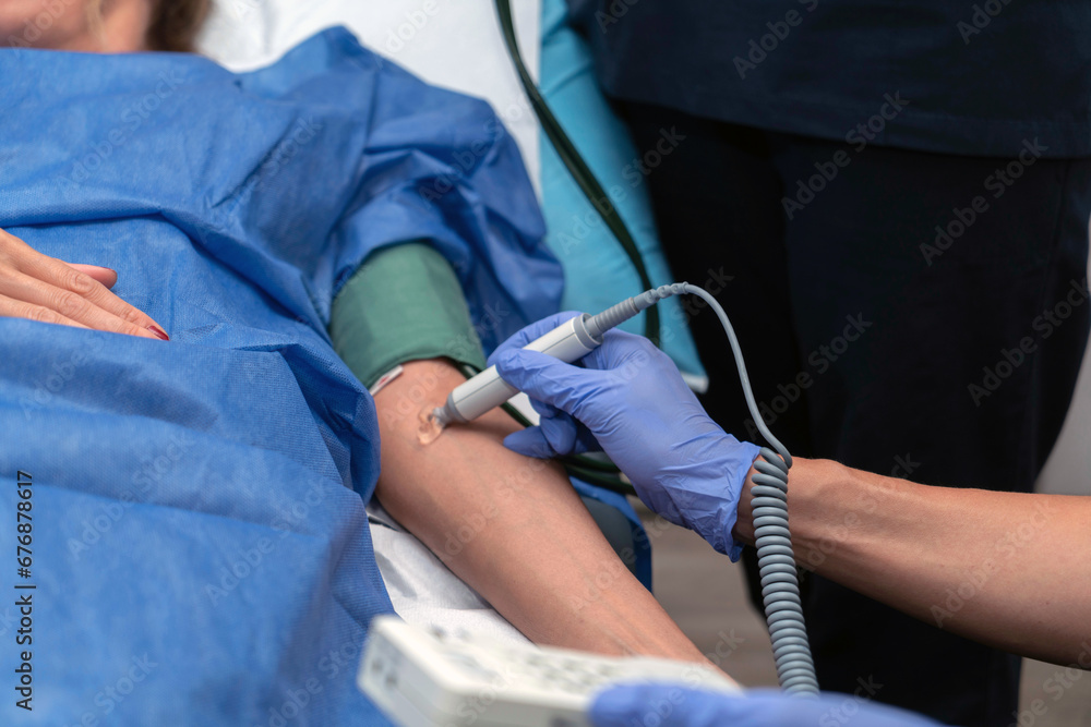 blood pressure measurement in the arm with the device, Ankle Brachial ...