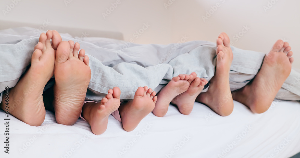 Family, feet and sleeping in bed, morning or relax together with kids ...