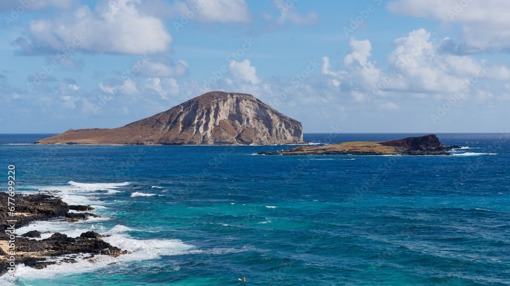Low-angle view from Makapuu Beach to Manana Island (also known as ...