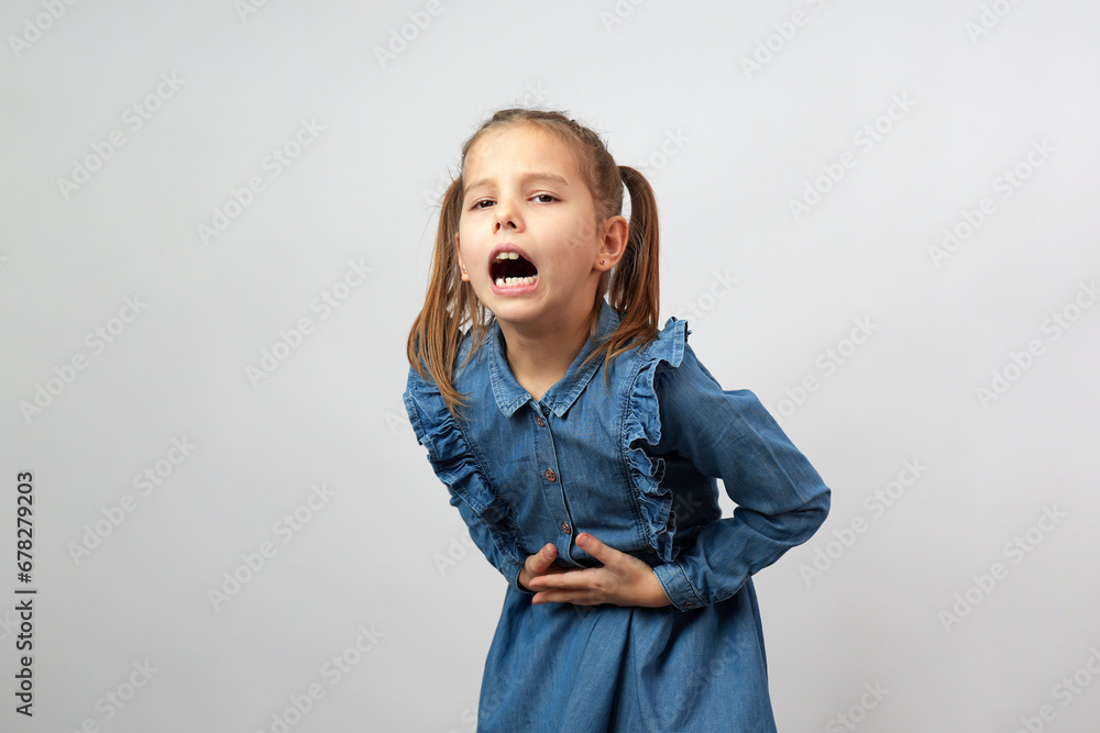 Little child girl touching belly stomach with suffering from stomach ...