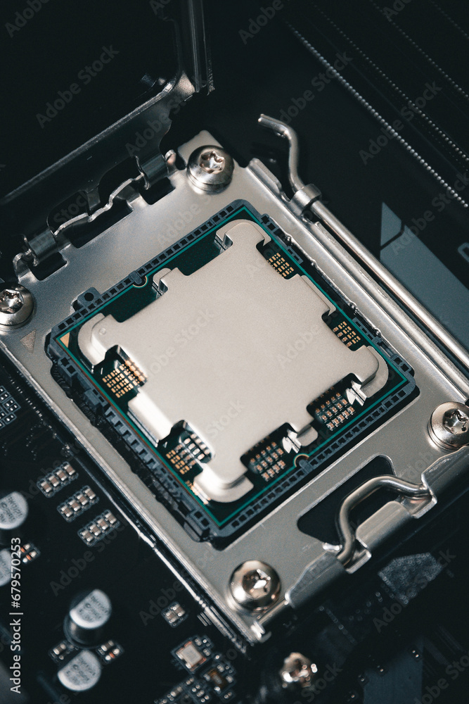 Computer processor from 2023 - CPU sitting in a motherboard on a gaming ...