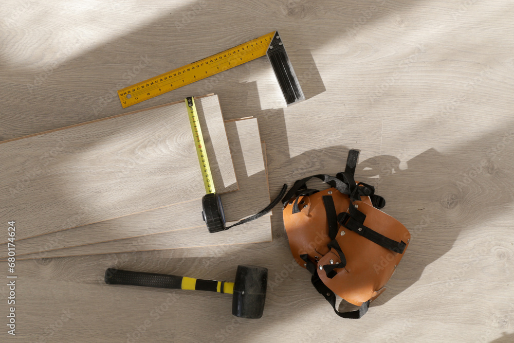 Rubber hammer, ruler with angle bar, tape meter, jig saw and other ...