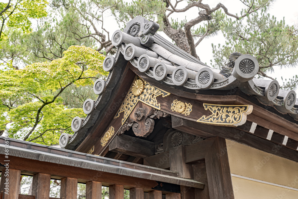 Clay tiles used in Japanese roofs along the Mitsudomoe symbol ...