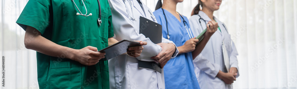Confident and professional team of medical staff stand in line together ...