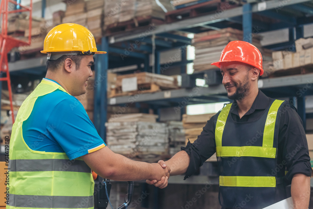 Teamwork Warehouse worker shakehand together. Engineer man hands ...