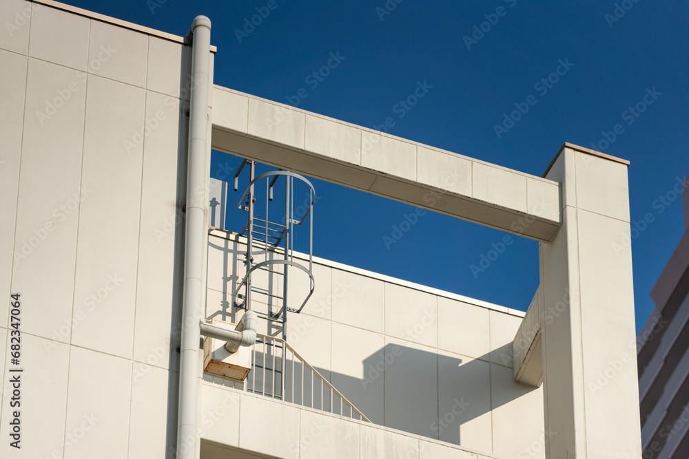 Fire escape stairway outside the high rise building tower, using for ...