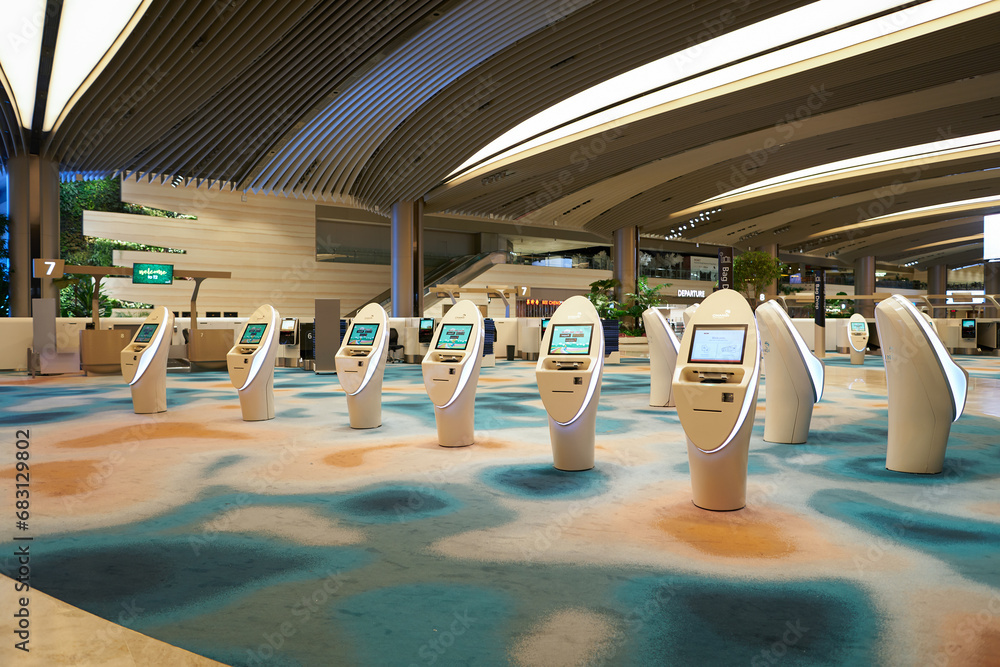 SINGAPORE - NOVEMBER 06, 2023: self check-in kiosks in Singapore Changi ...