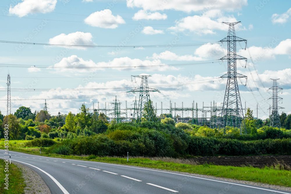 Industrial nature landscape with high voltage power lines transmission ...