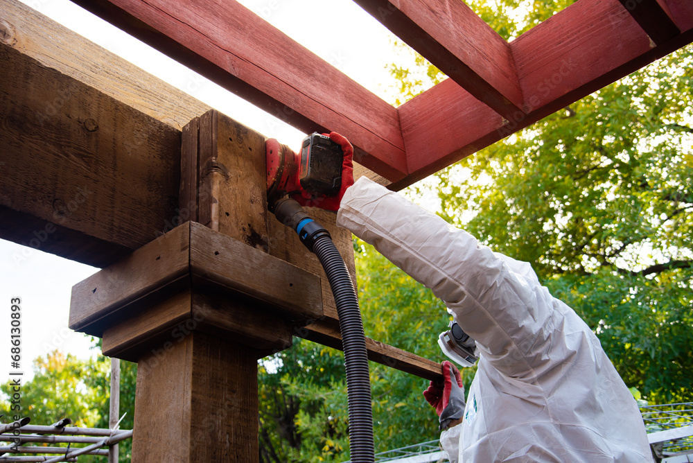 Looking up view Asian man in full body hazmat suit, respirator mask ...