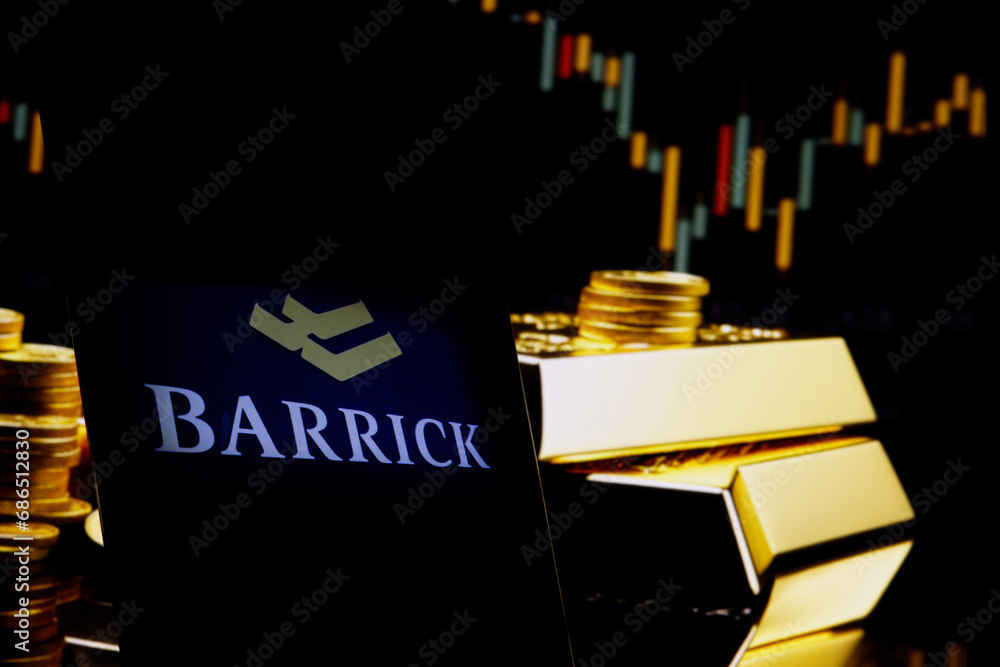 Barrick logo on phone, blurred gold bars on the background, USA ...