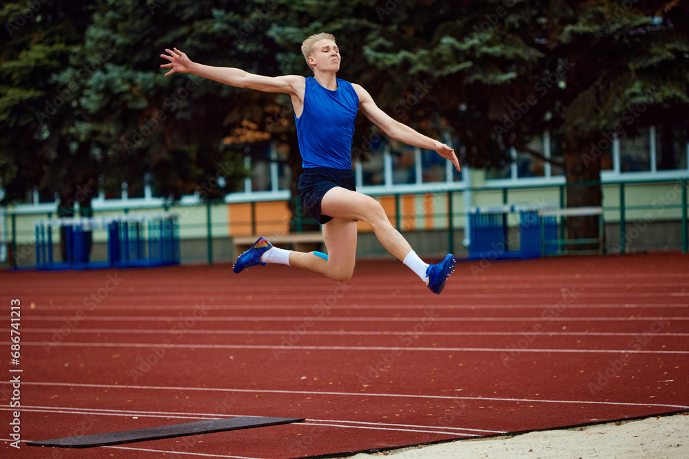 Form and function harmonize in the airborne elegance of a long jump ...