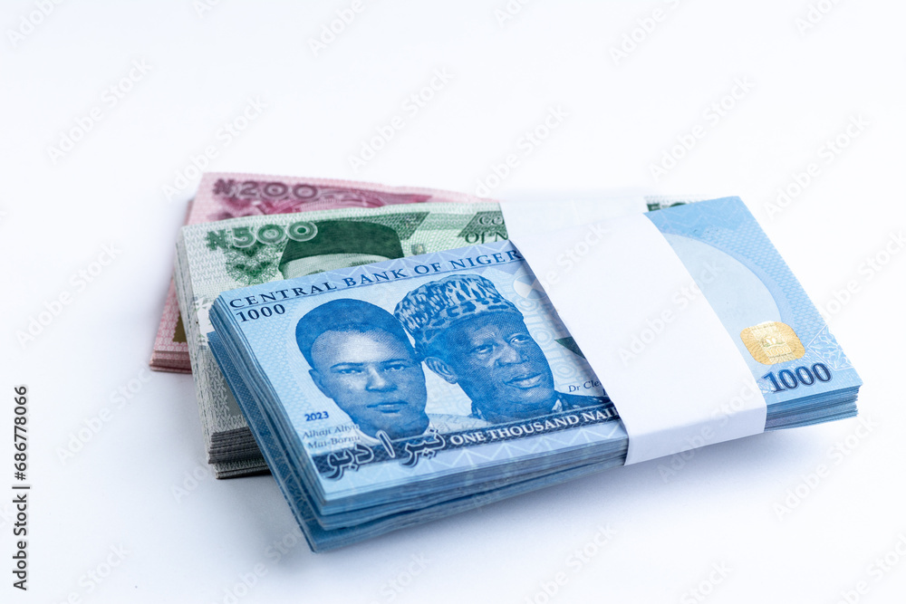 Wads, bundle of Nigerian Naira notes on a white background Stock Photo ...