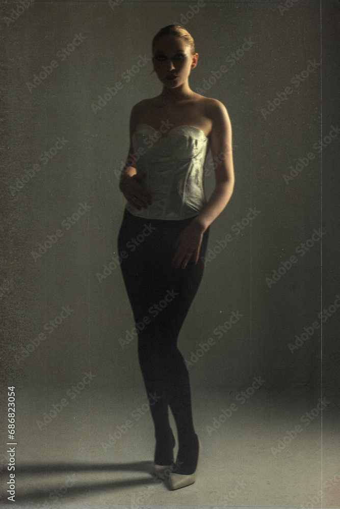 Beautiful woman full body silhouette portrait. Part of model covered in ...