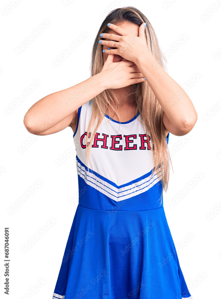 Foto de Stock Young beautiful blonde woman wearing cheerleader uniform ...